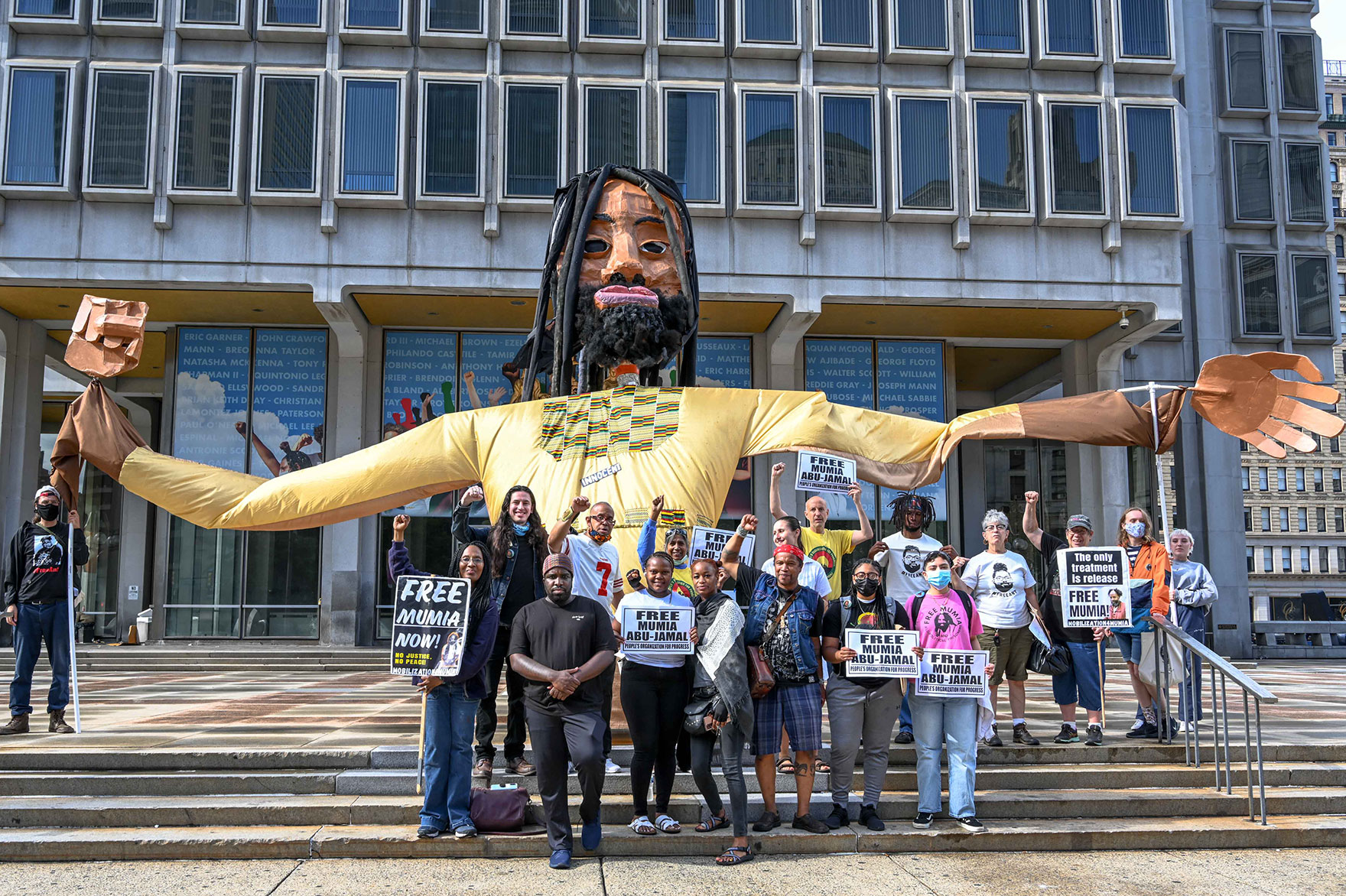Remembering Consuewella Africa. Giant Mumia Puppet in downtown ...